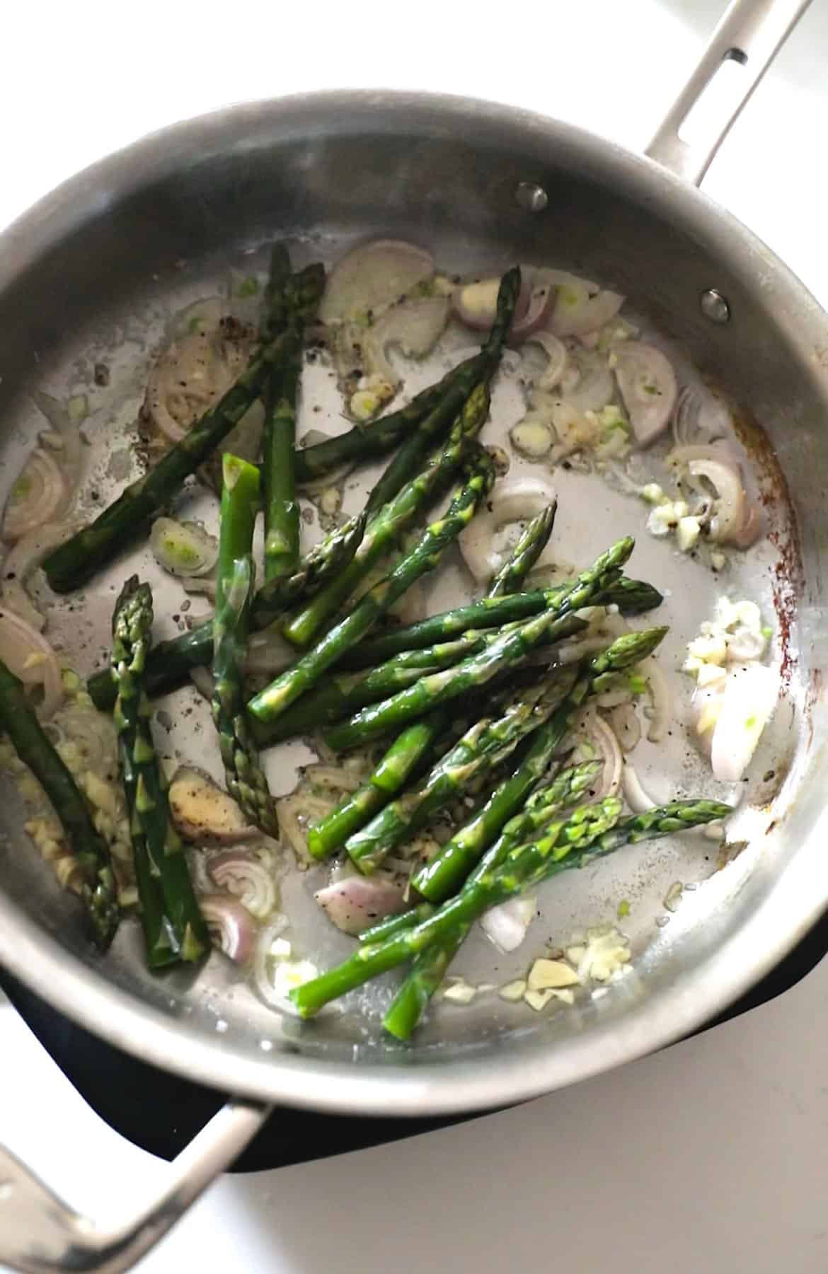 Spring Risotto with Garlic Butter Shrimp - Britney Breaks Bread