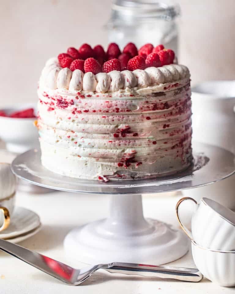 Bakery Style White Chocolate Raspberry Cake - Britney Breaks Bread